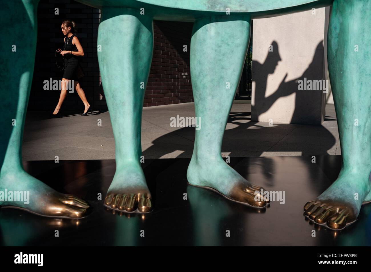 "24.05.2018, Singapore, , Singapore - A woman walks past the sculptural ...