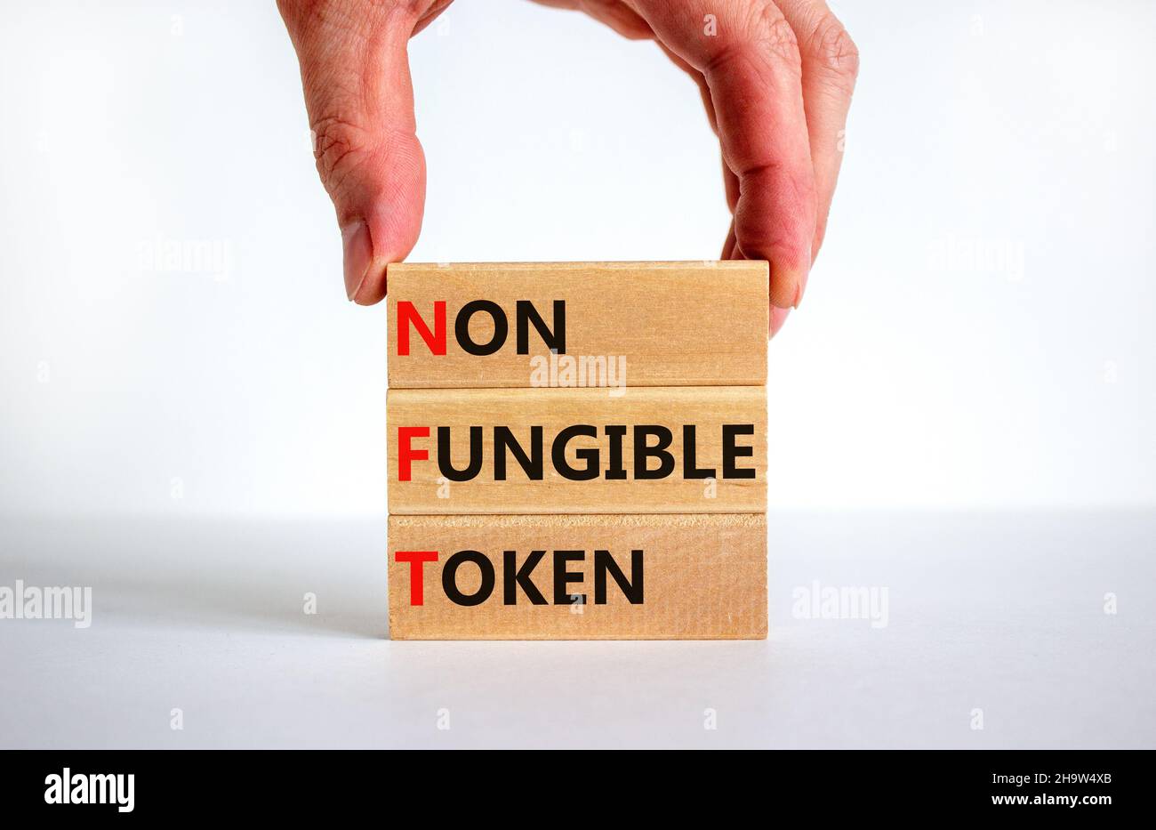 NFT non-fungible token symbol. Concept words NFT non-fungible token on ...