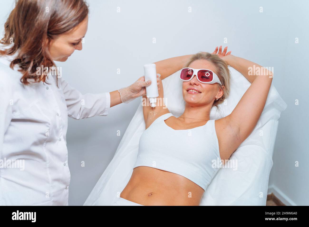 Laser epilation and cosmetology in beauty salon. Laser hair removal ...