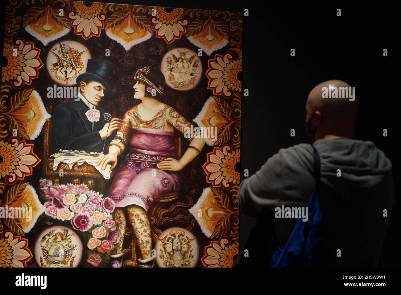 Madrid, Spain. 08th Dec, 2021. Charlie wagner tattooing his wife ...