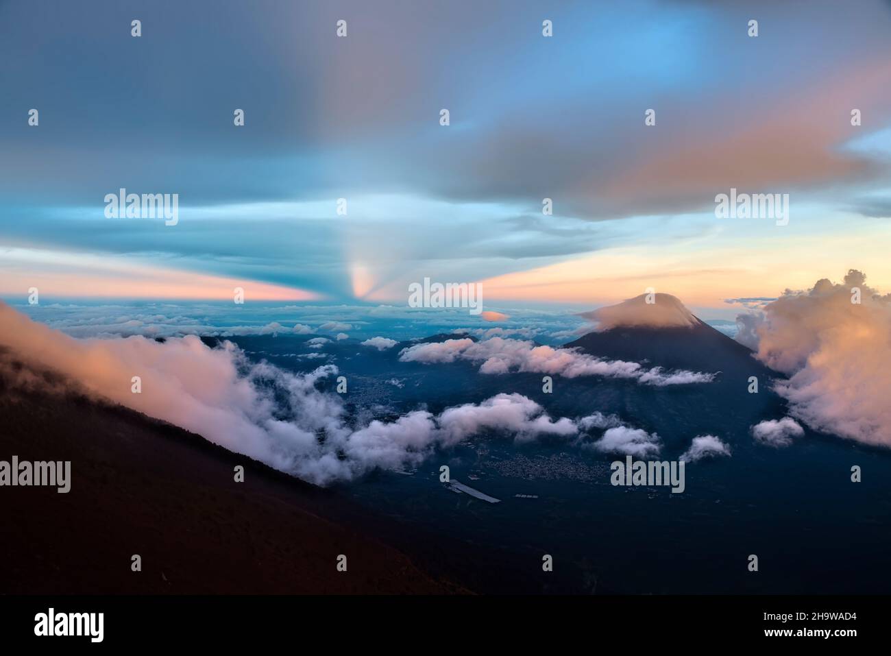 Cloud cap on Santiago Atitlan volcano at sunset from Acatenango ...