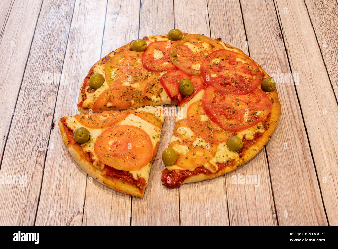 Neapolitan pizza, with a soft and thin crust but high edges, is the ...