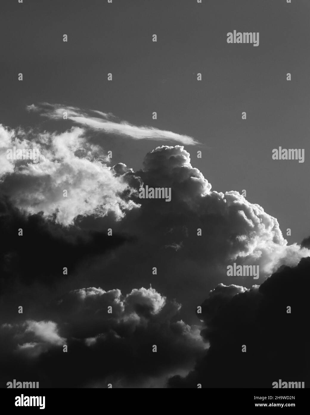 Sunlight and dark clouds Black and White Stock Photos & Images - Alamy