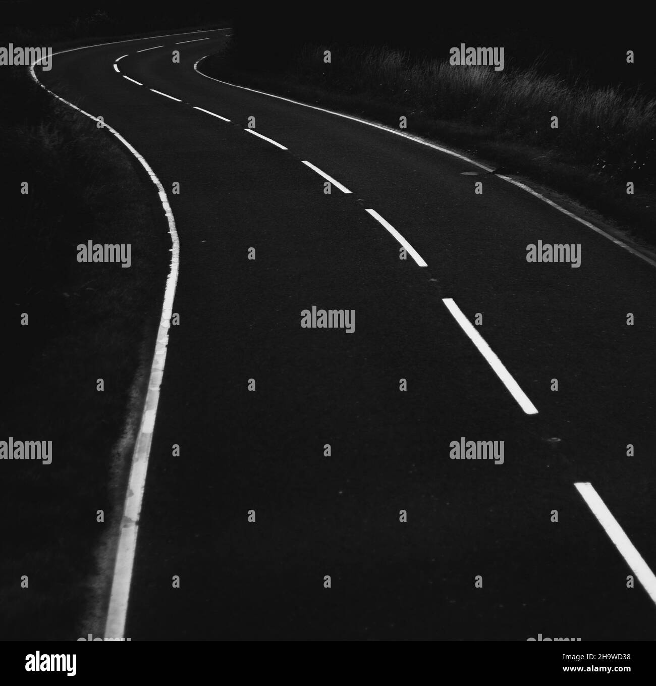 Long twisting road Black and White Stock Photos & Images - Alamy