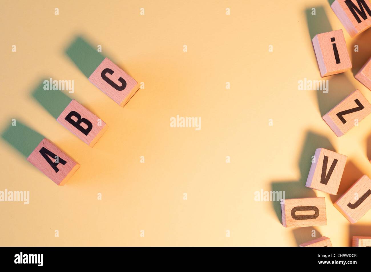 Letters A, B, and C are taken from a pile of wooden letter blocks with ...