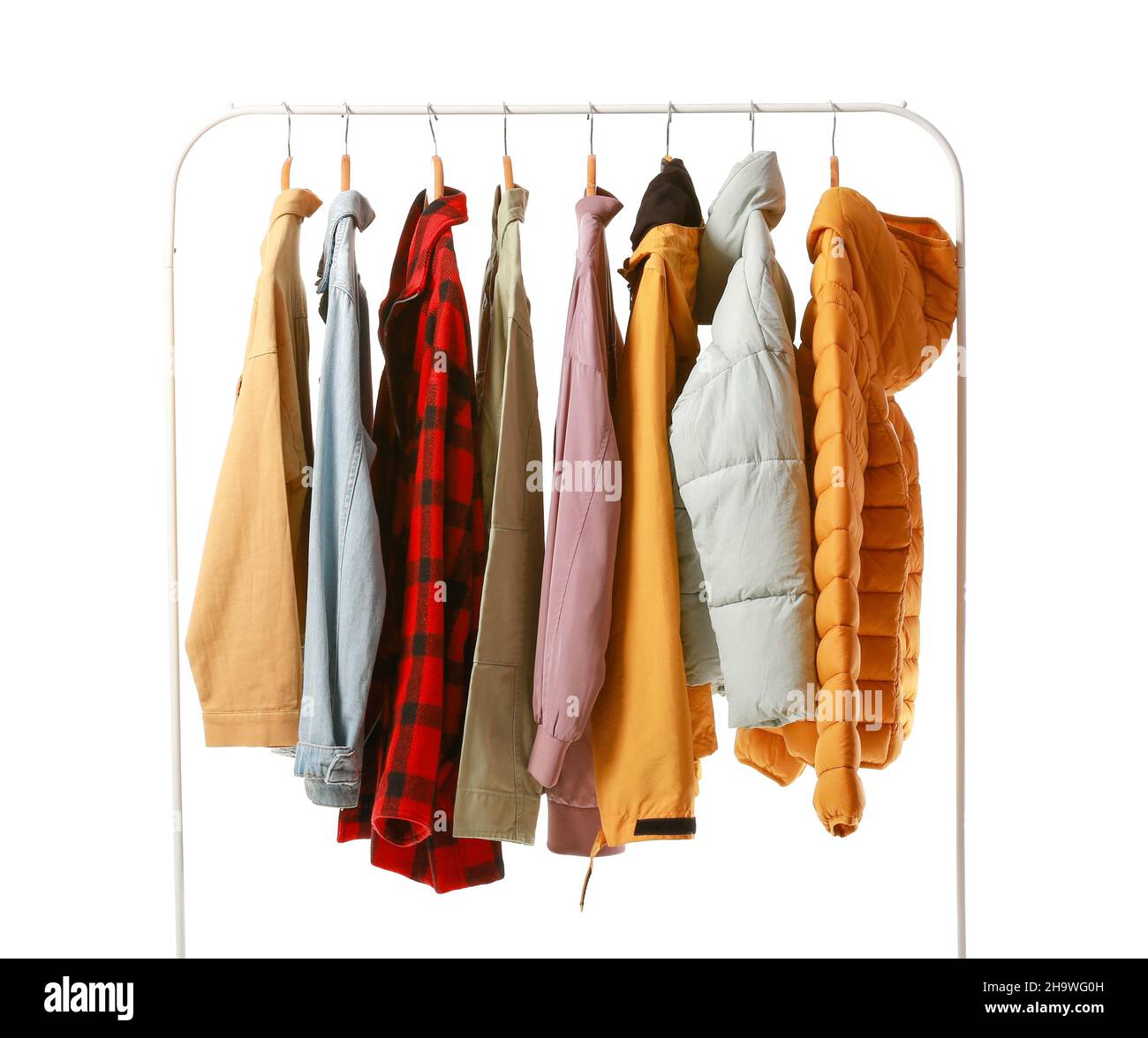 Rack with different stylish jackets on white background Stock Photo - Alamy