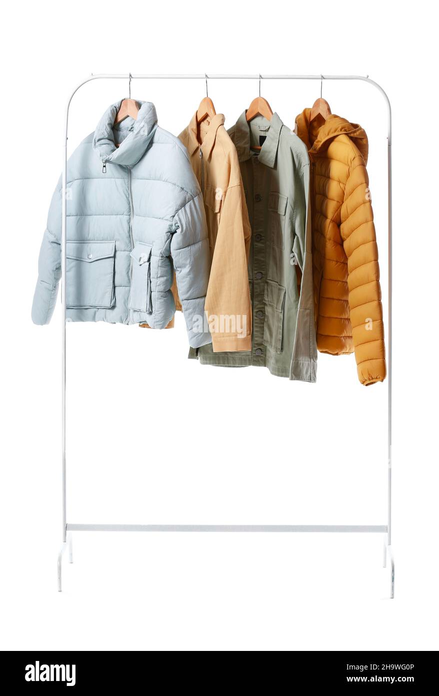 Rack with stylish jackets on white background Stock Photo - Alamy
