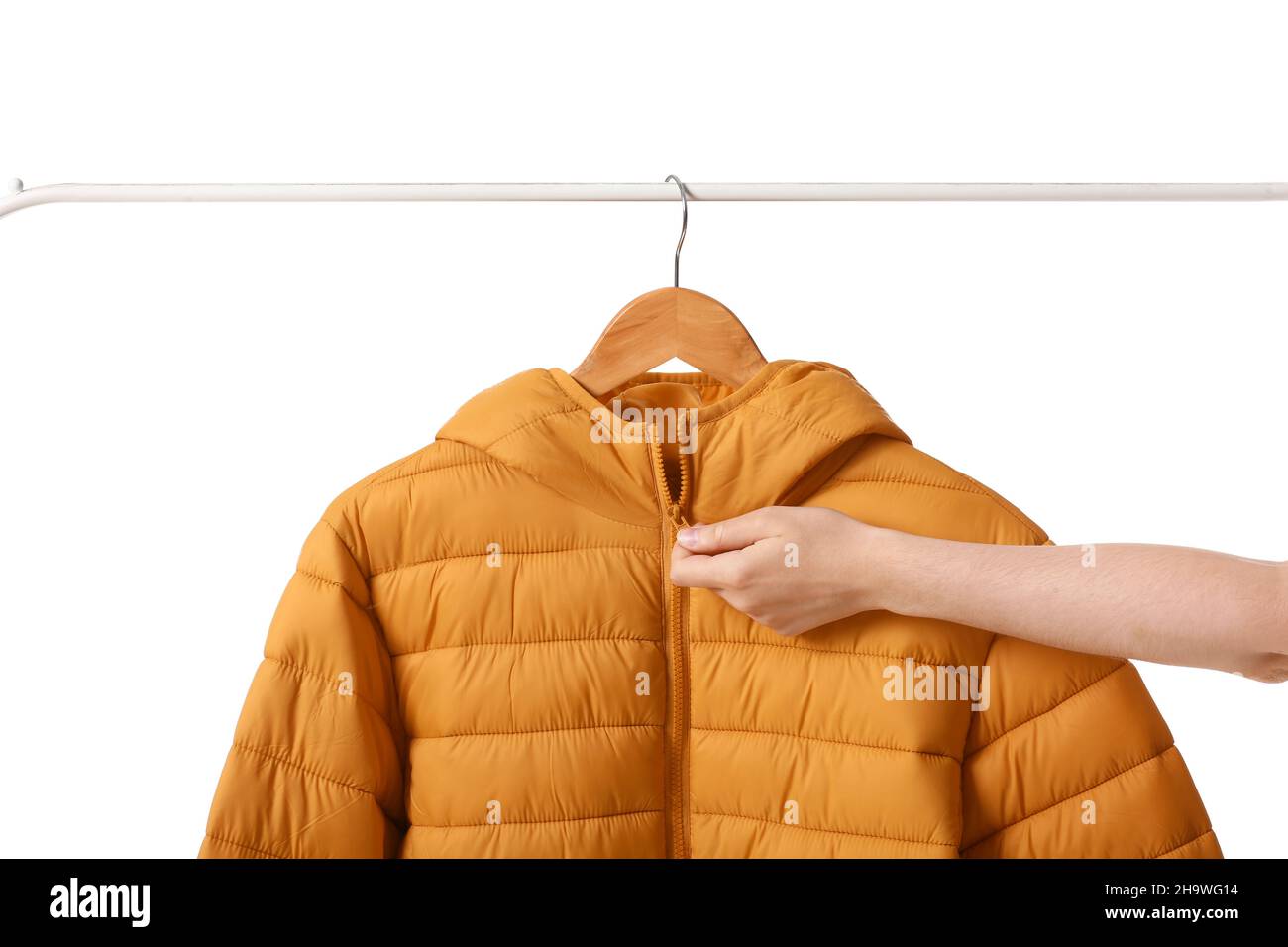 Girl zipping up jacket hi-res stock photography and images - Alamy