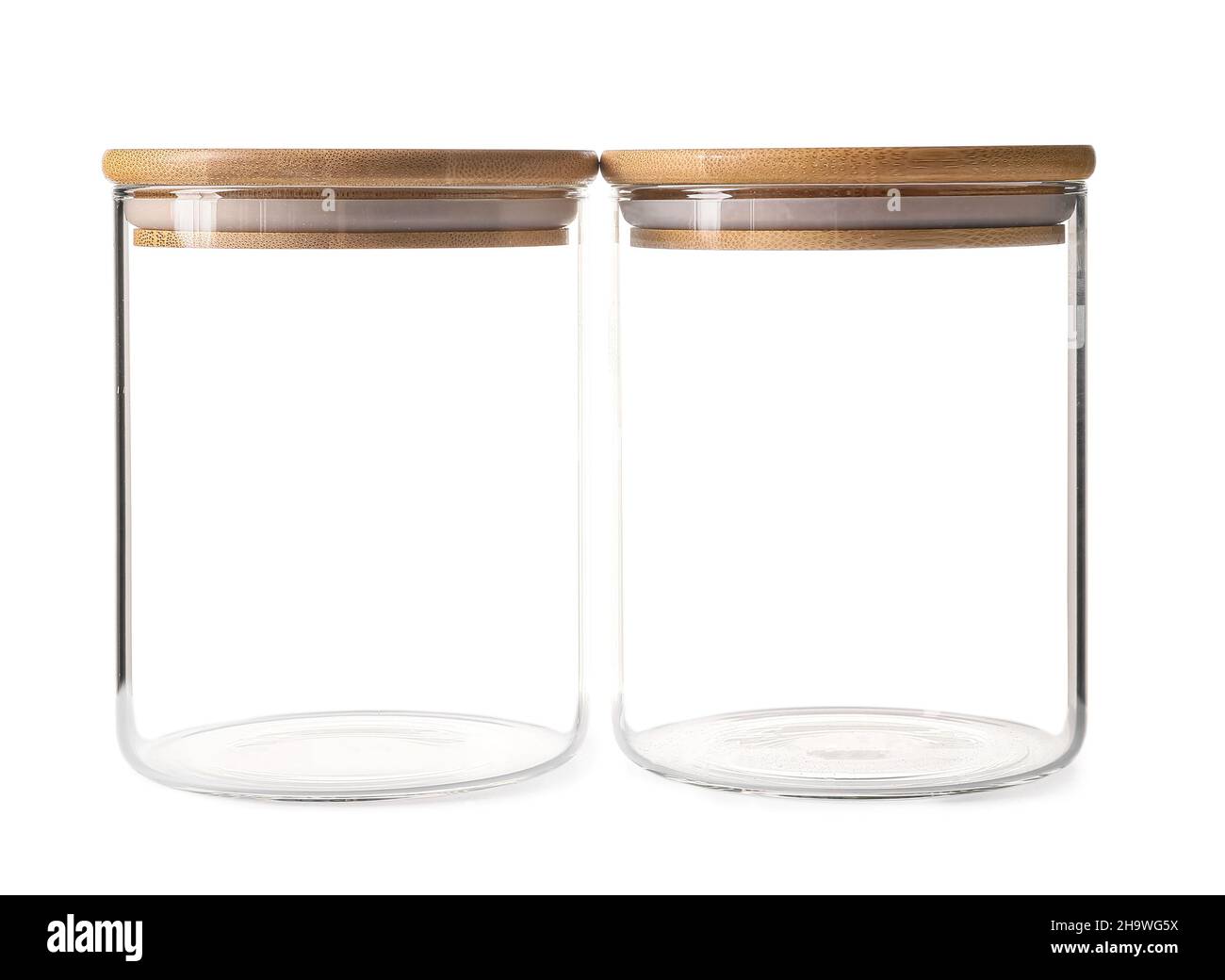 New glass jars isolated on white background Stock Photo - Alamy