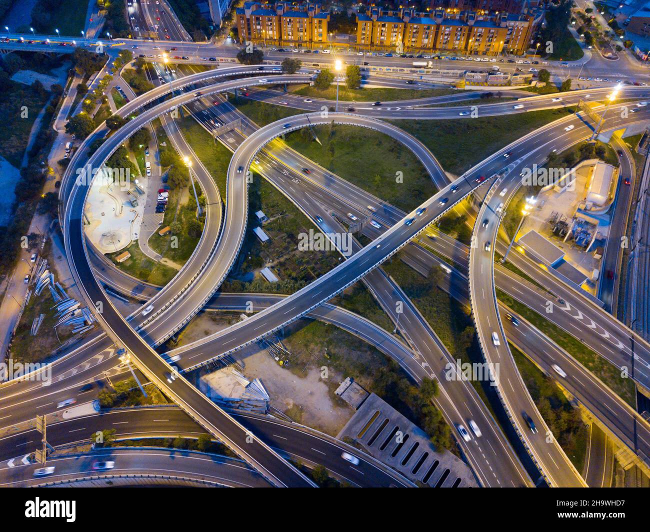Aerial view of highway interchange at dusk Stock Photo - Alamy