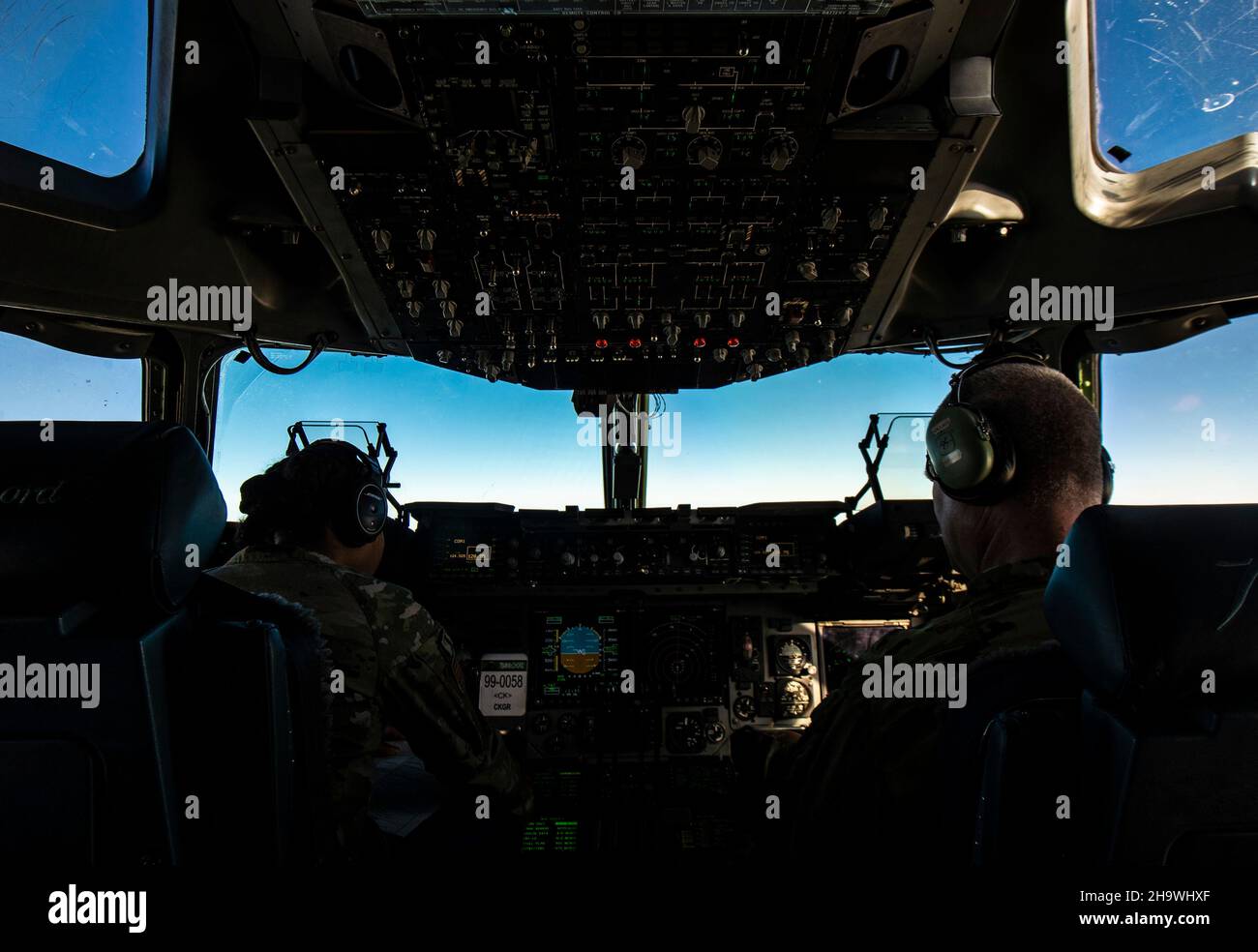 U.S. Air Force 1st Lt. Erica Drakes, 4th Airlift Squadron pilot, left ...