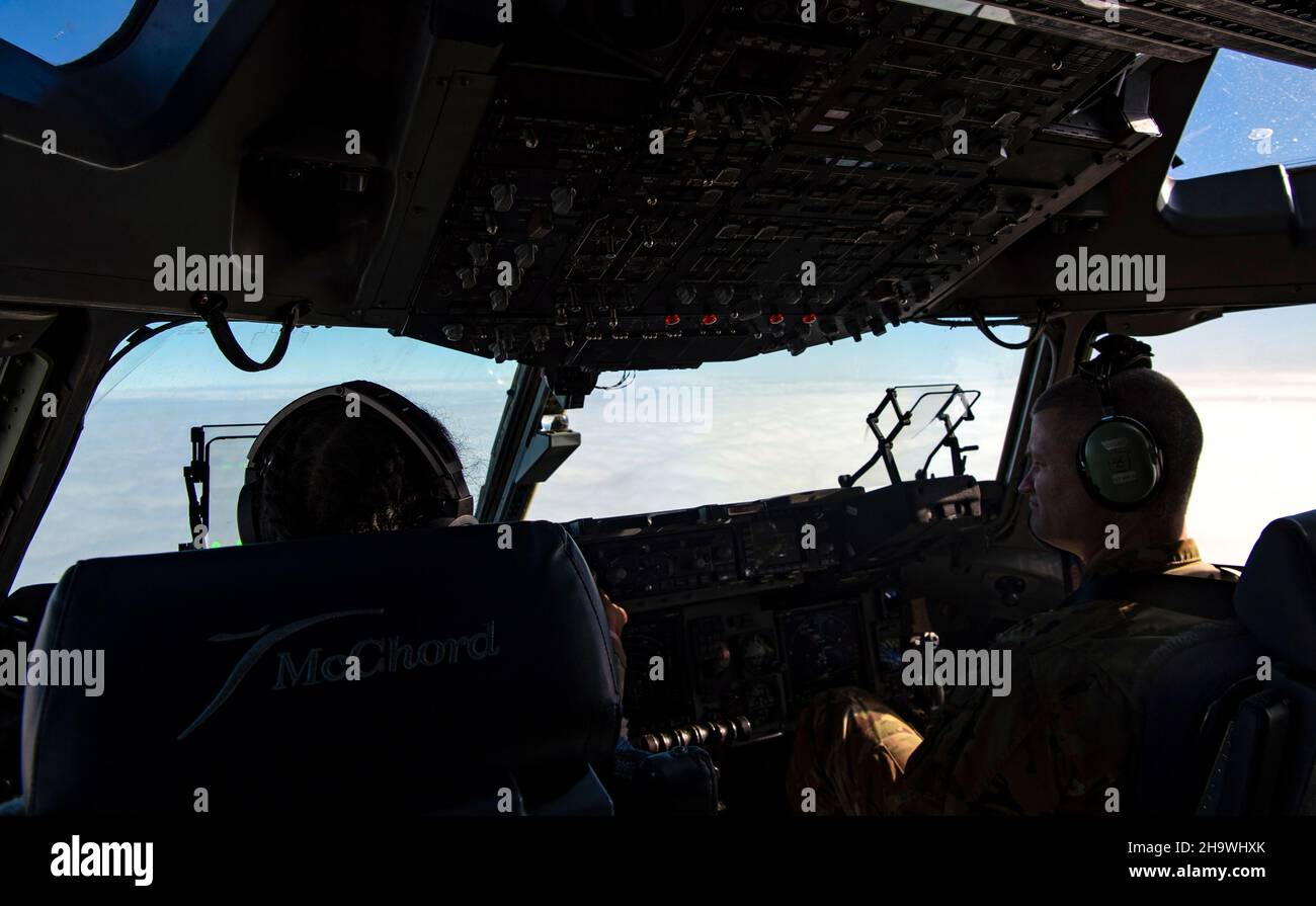 U.S. Air Force 1st Lt. Erica Drakes, 4th Airlift Squadron pilot, left ...