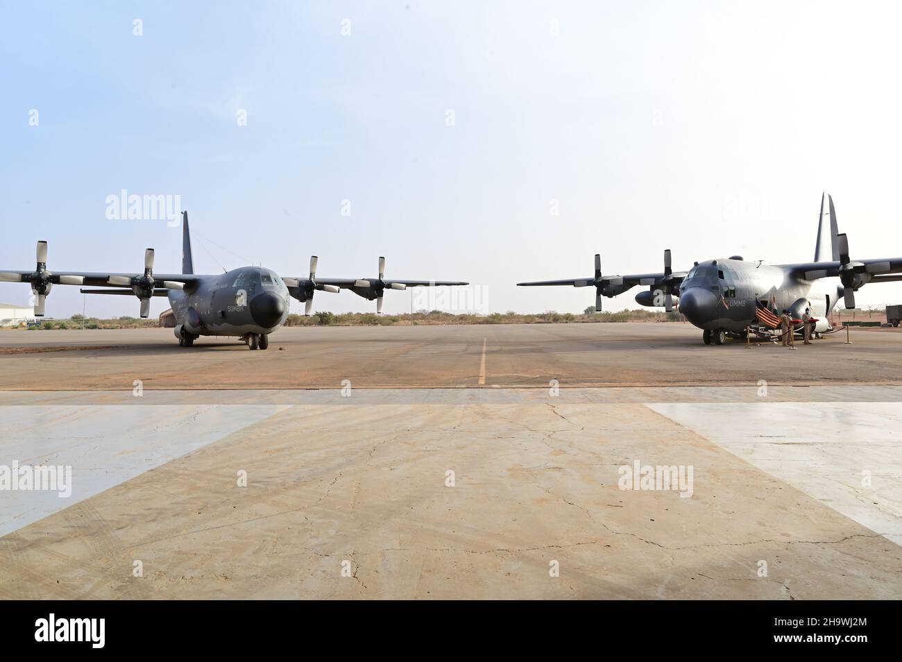 Two C-130H Hercules delivered to the Nigerien Armed Forces sit side-by ...