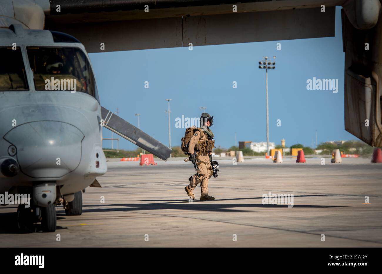 A U.S. Marine with Marine Medium Tiltrotor Squadron (VMM) 161 (Reduced ...
