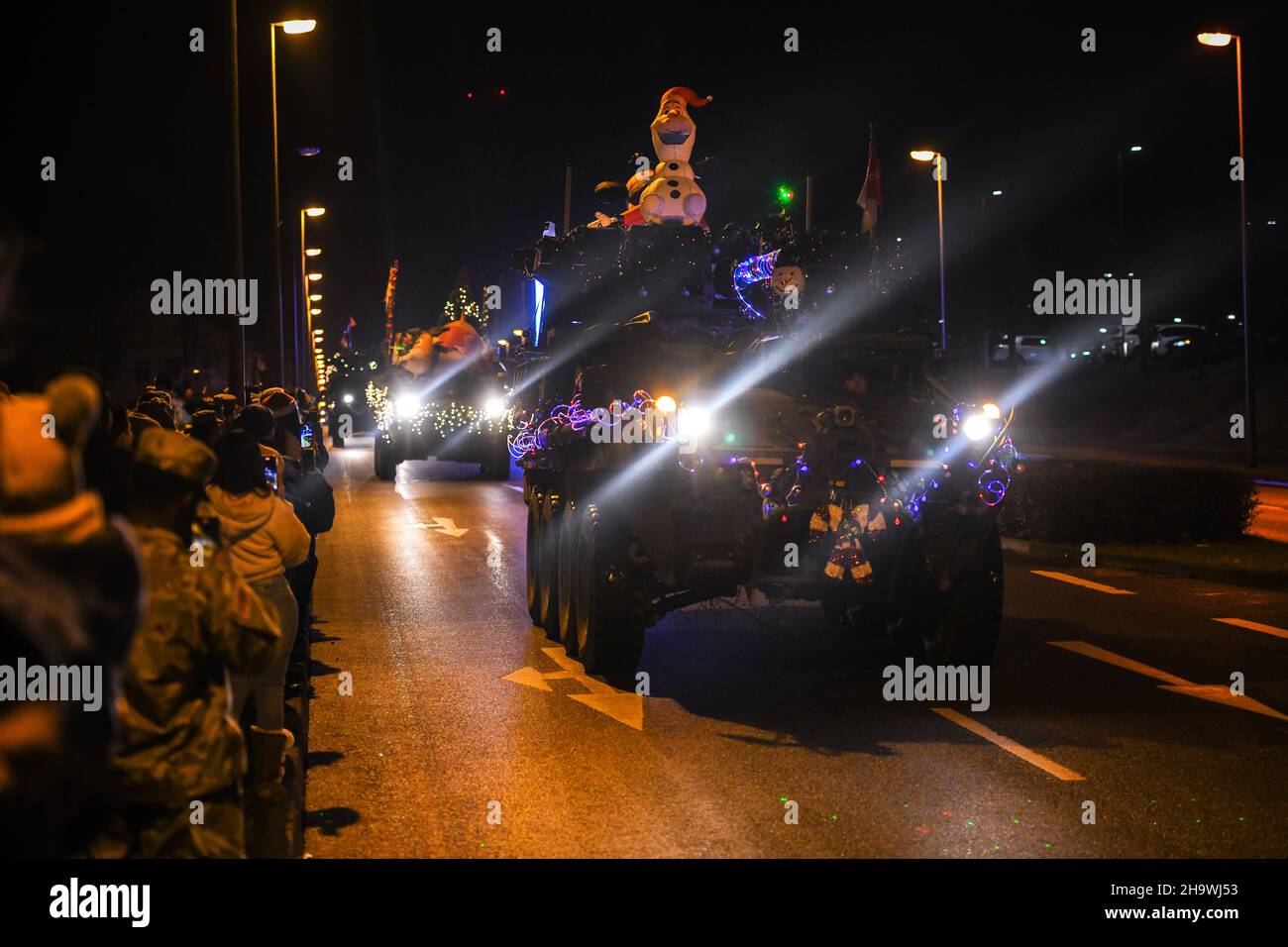 U.S. Soldiers assigned to the 2nd Cavalry Regiment decorate dozens of ...