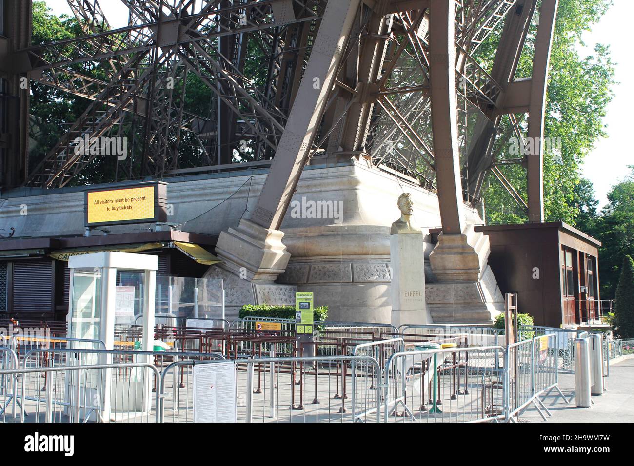 Empty ticket queue at the base of the Eiffel Tower in Paris, France. In ...