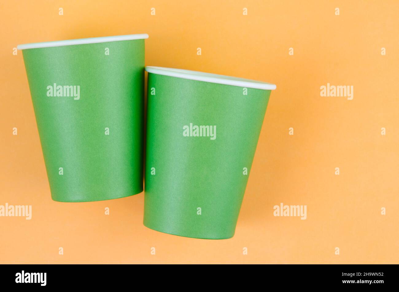 Green color paper drink glass disposable. Eco friendly concepts Stock ...