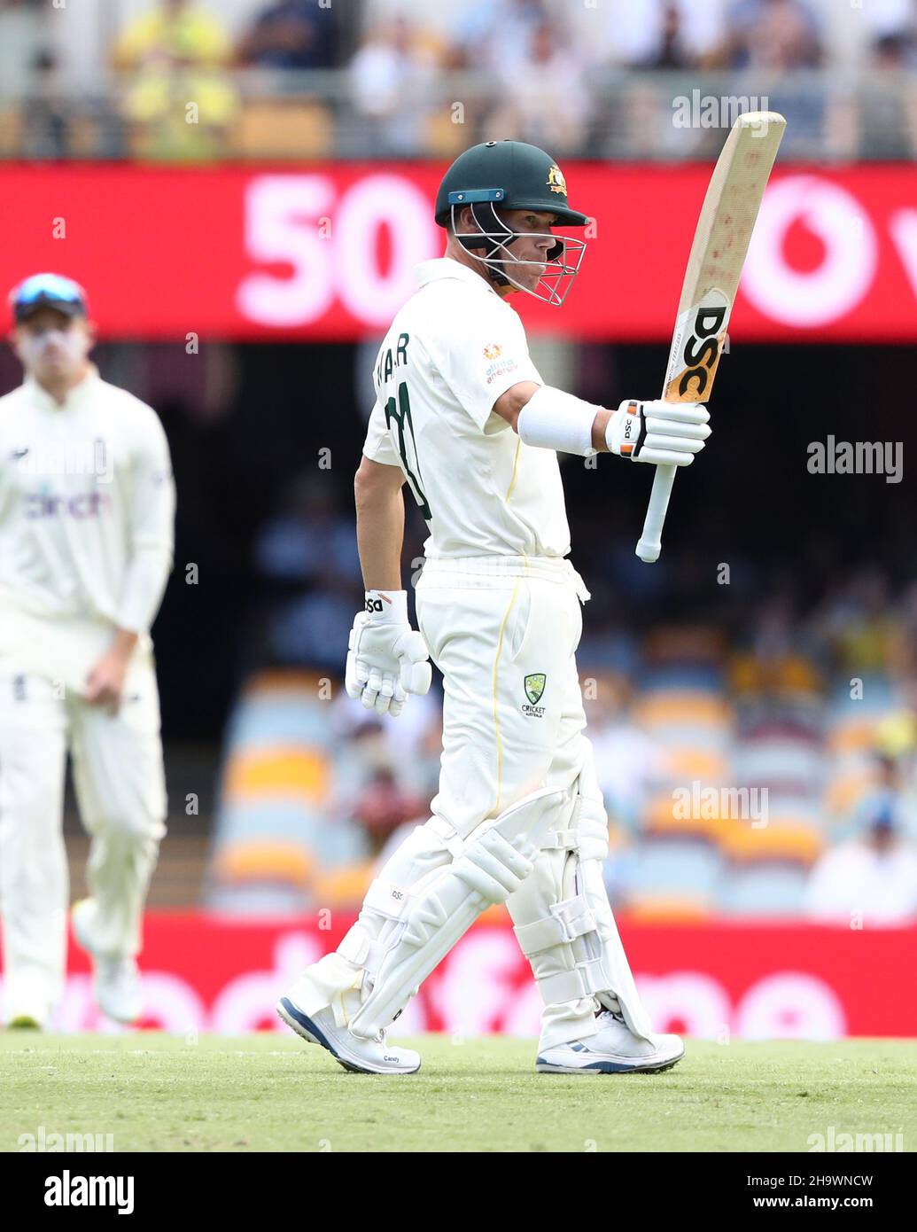 Australia's David Warner celebrates his 50 during day two of the first ...