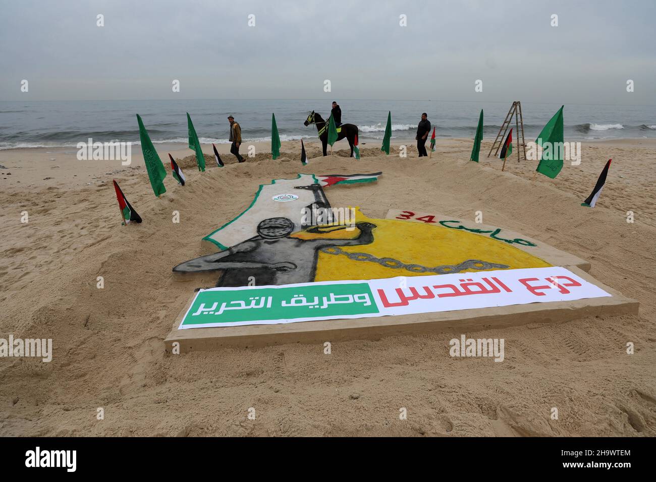 A sand graffiti with slogans made by Palestinians at the beach on the ...