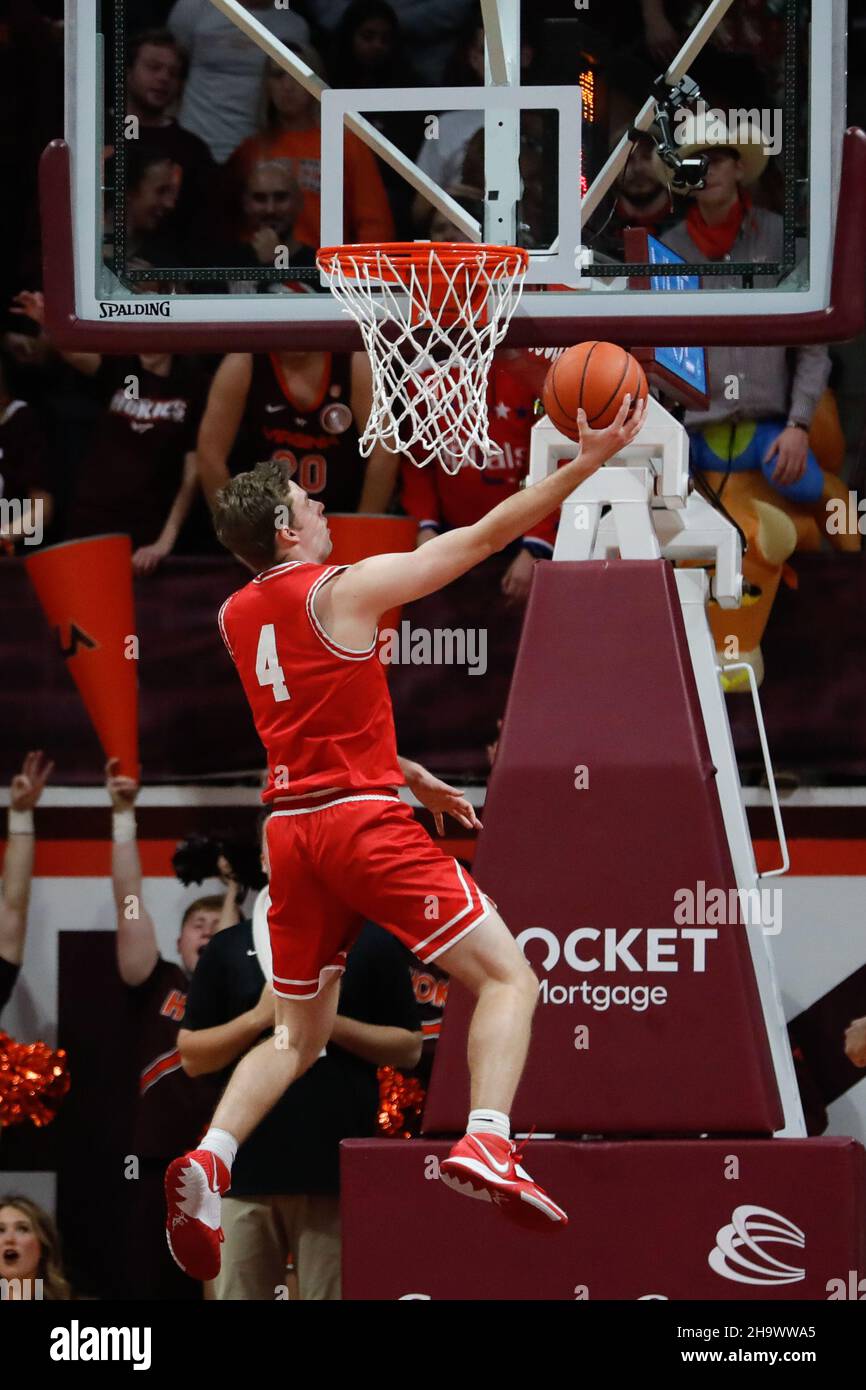 December 08, 2021: Cornell Big Red guard Greg Dolan (4) lays the ball ...