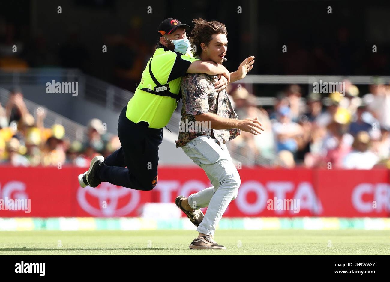 A Pitch Invader enters the field during day two of the first Ashes test ...
