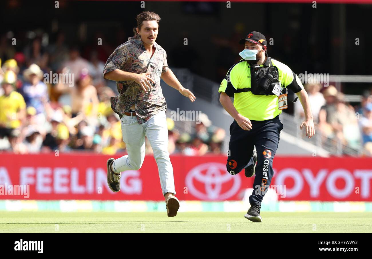 A Pitch Invader enters the field during day two of the first Ashes test ...