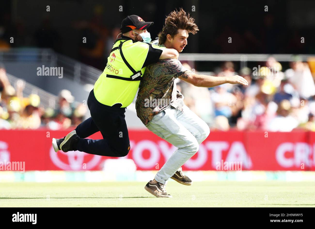 A Pitch Invader enters the field during day two of the first Ashes test ...