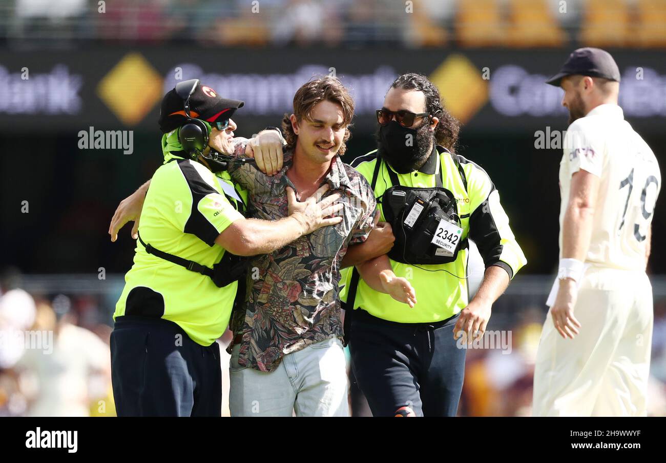 A Pitch Invader enters the field during day two of the first Ashes test ...