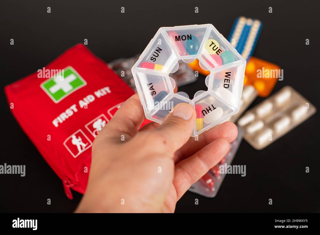 Top view of a first aid medical kit on black background Stock Photo - Alamy