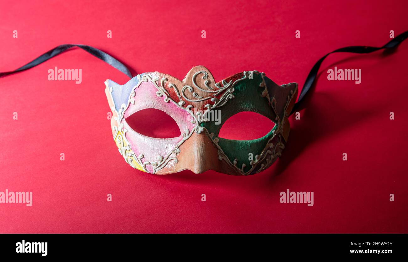 Carnival Venetian mask colorfoul handmade on red color background ...