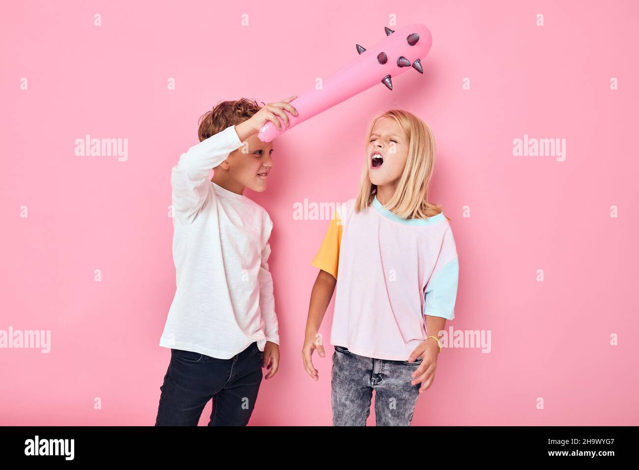 Boy hits girl hi-res stock photography and images - Alamy
