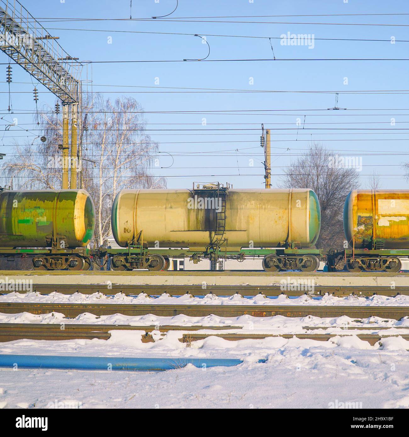 Railway tanks at the station against the blue sky Stock Photo - Alamy