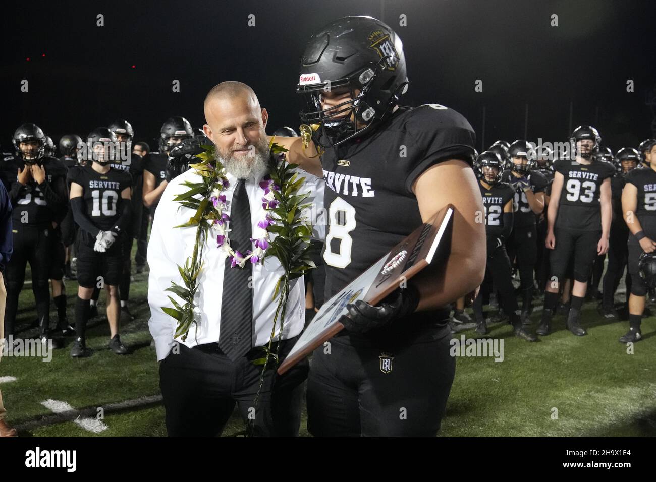 Servite Friars coach Troy Thomas (left) and defensive lineman Maxx ...