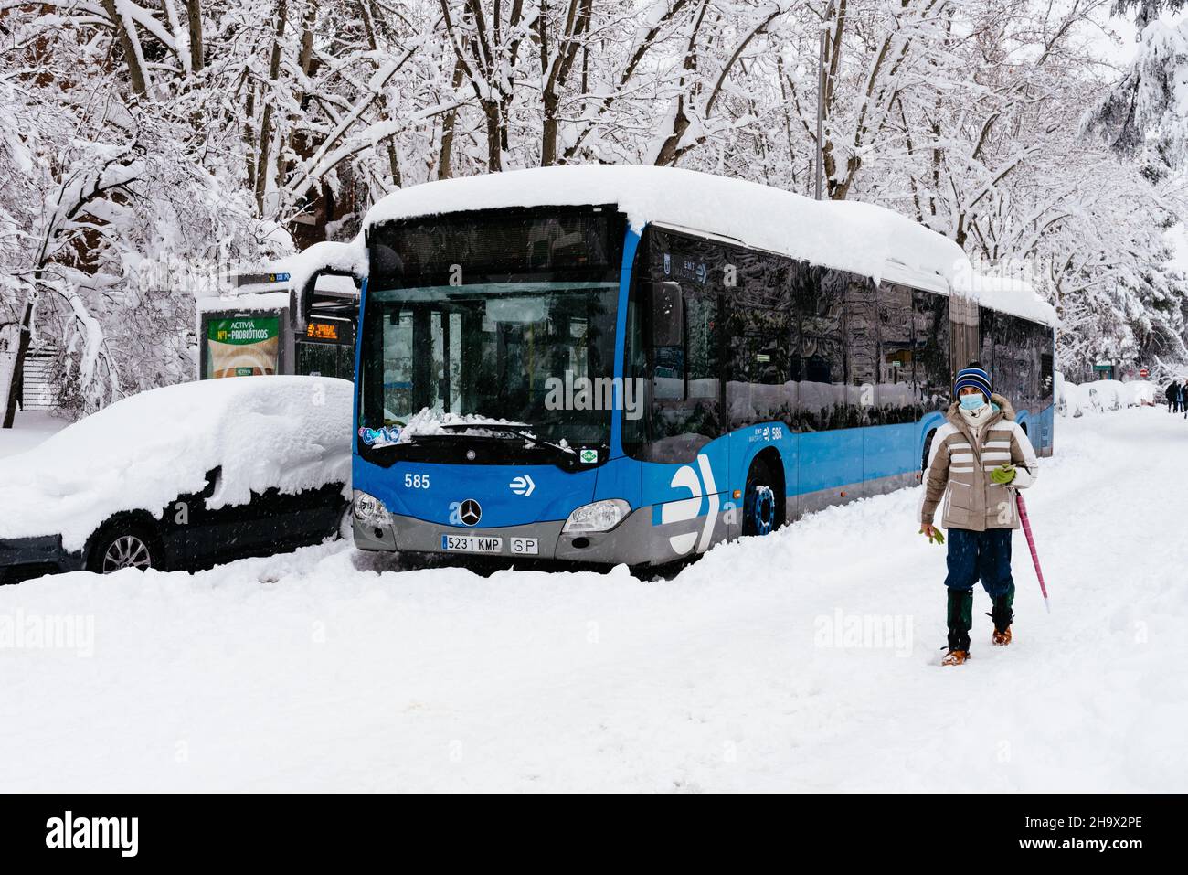 Madrid, Spain - January 9, 2021: Bus trapped on the street during heavy ...