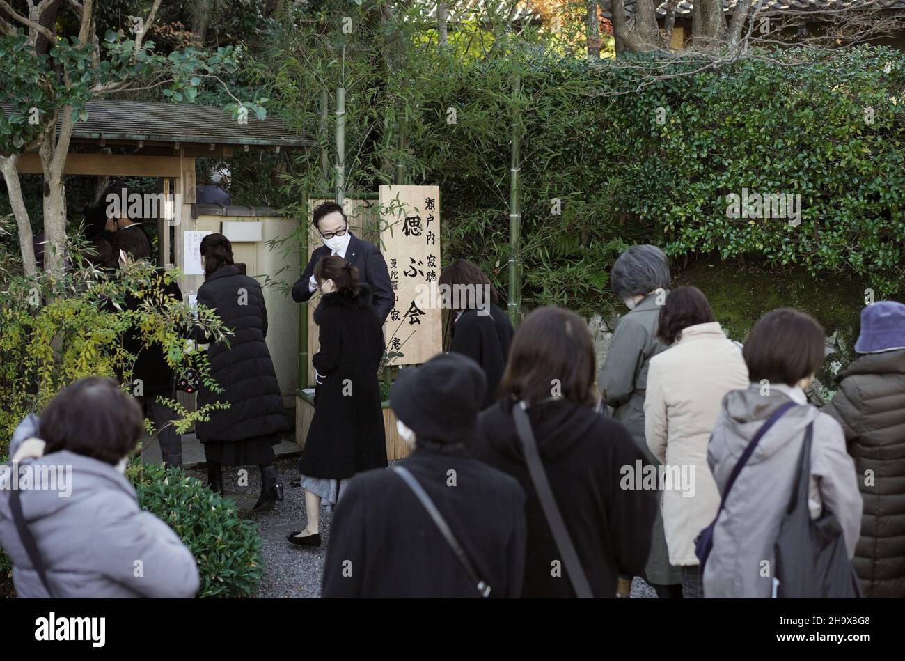 People arrive at the home of the late Japanese novelist and Buddhist ...