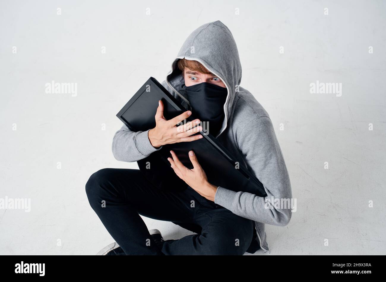 hacker hooded head hacking technology security light background Stock ...