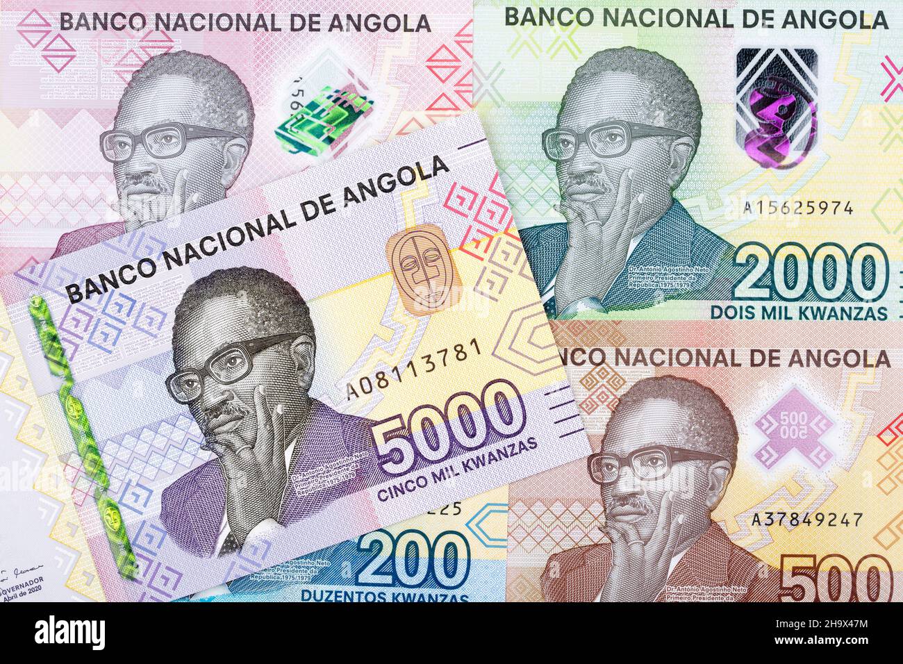 Angolan money - Kwanza a business background Stock Photo - Alamy
