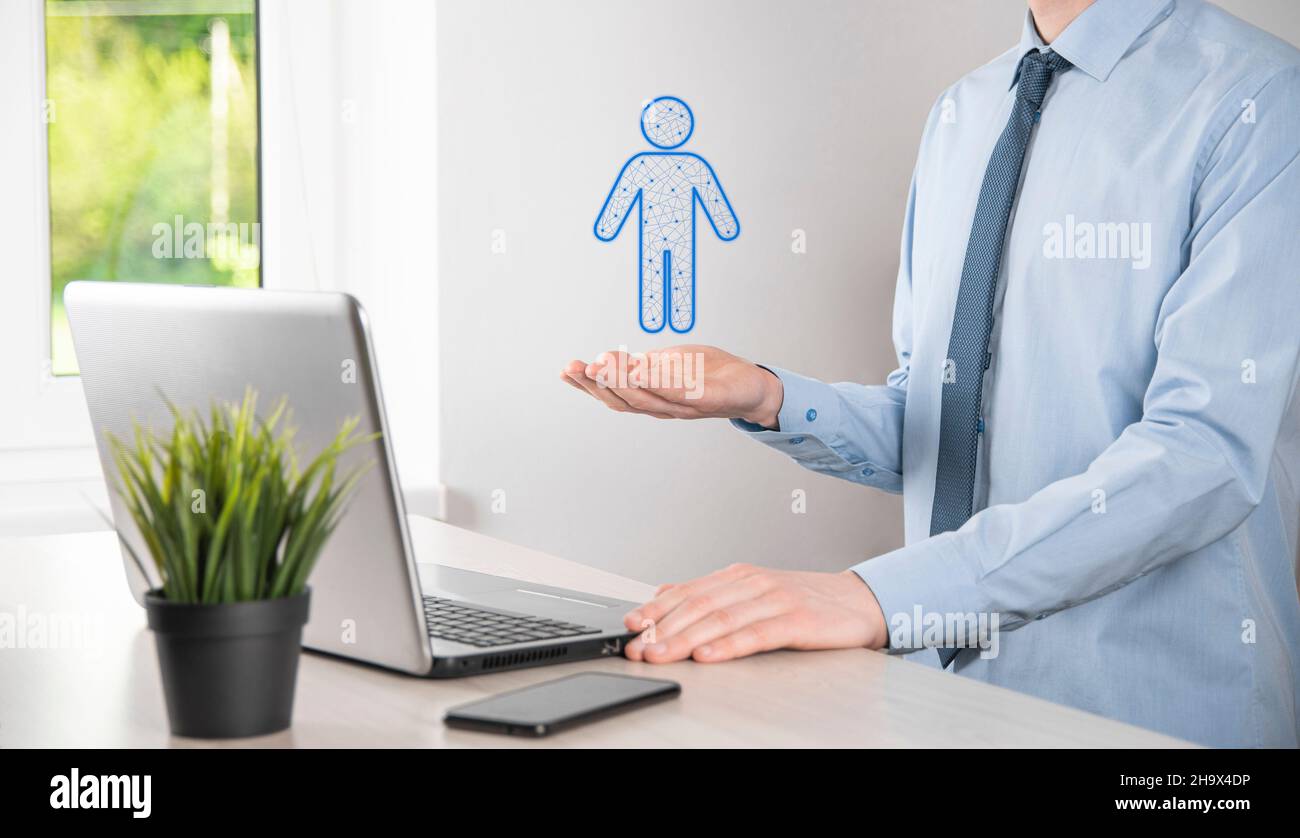 Businessman holds man person icon on dark tone background.HR Human ...