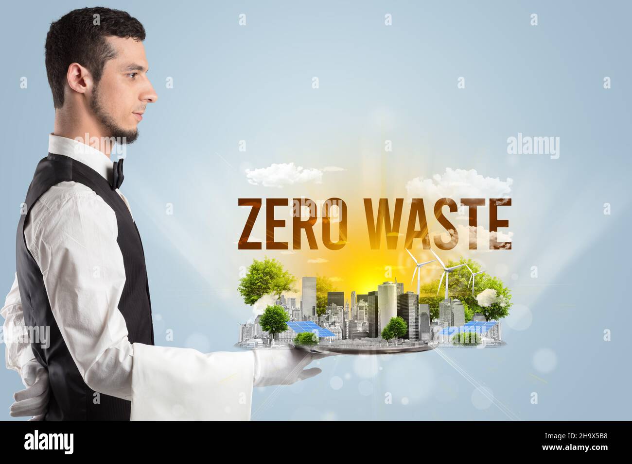 Waiter serving eco cityscape concept Stock Photo - Alamy