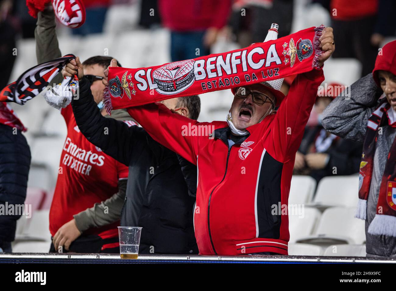 Lisbon, Portugal. 08th Dec, 2021. An SL Benfica fan holds a scarf while ...