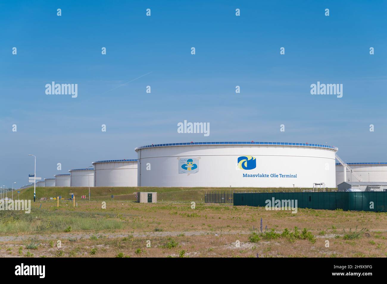 ROTTERDAM - JUNE 1, 2019: Oil storage tanks in the Maas area, a massive ...