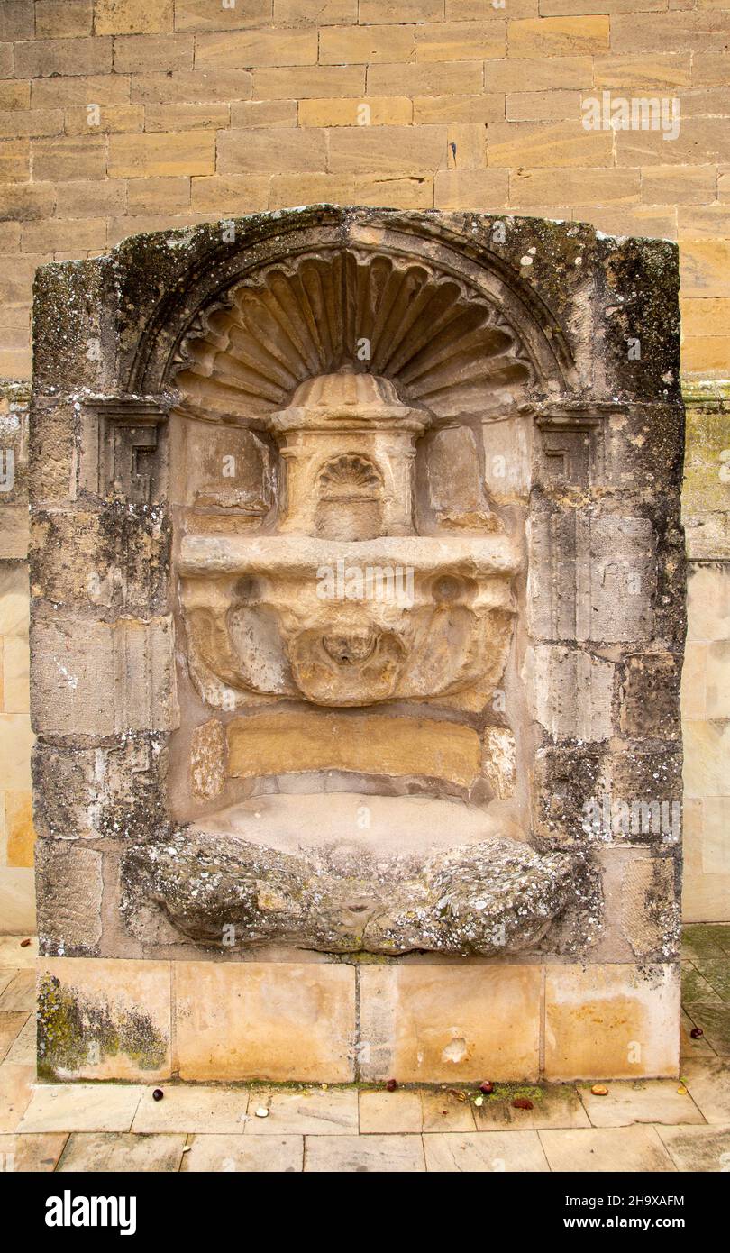 Historic carved stonework of water fountain in village of Laguardia ...