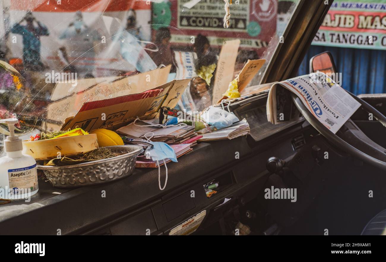 Car dashboard full of stuff Stock Photo - Alamy