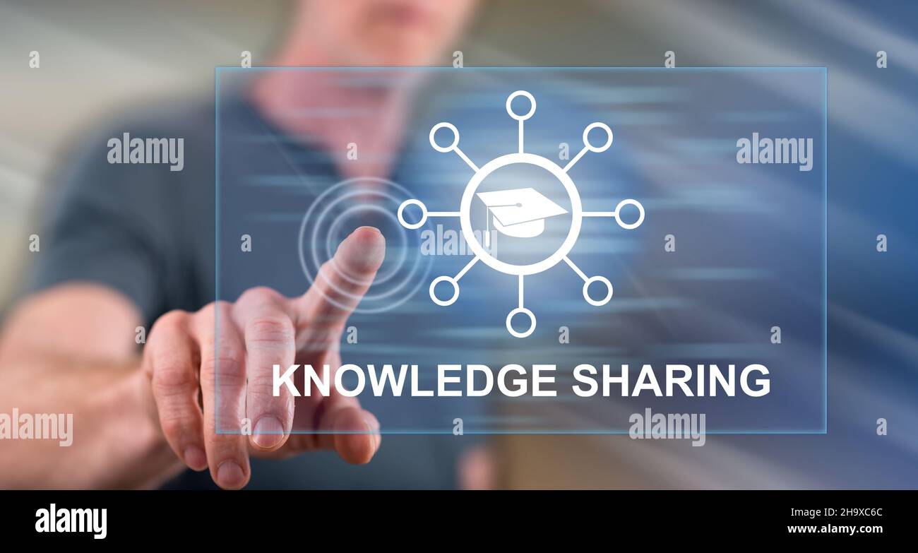 Man touching a knowledge sharing concept on a touch screen with his finger Stock Photo - Alamy