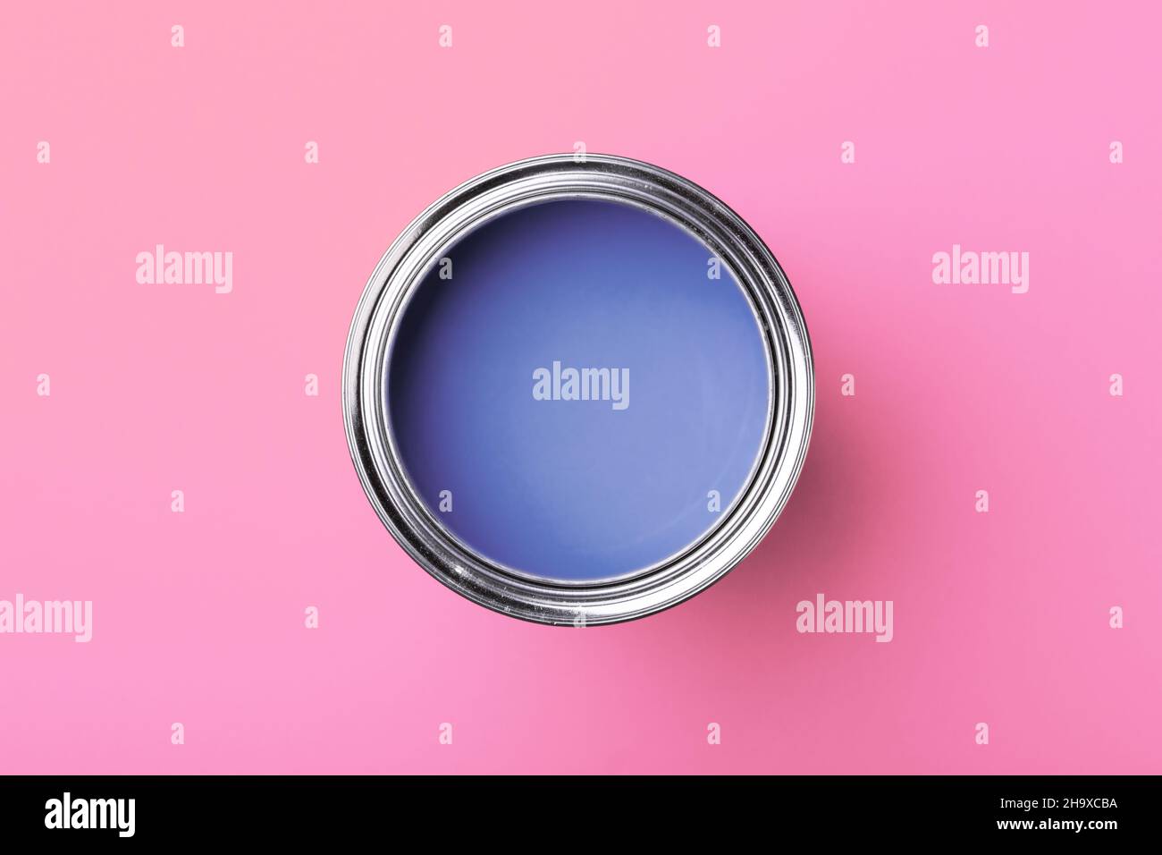 Can of very trendy 2022 color peri on pink background Stock Photo - Alamy