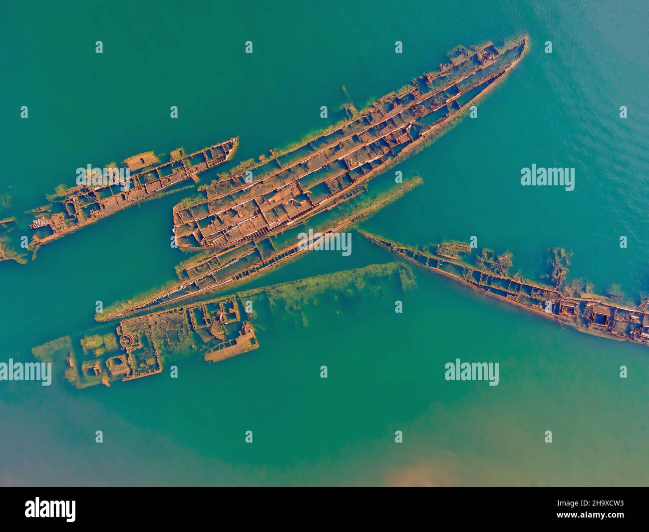 Abandoned broken shipwreck sticking out of the sea Stock Photo - Alamy