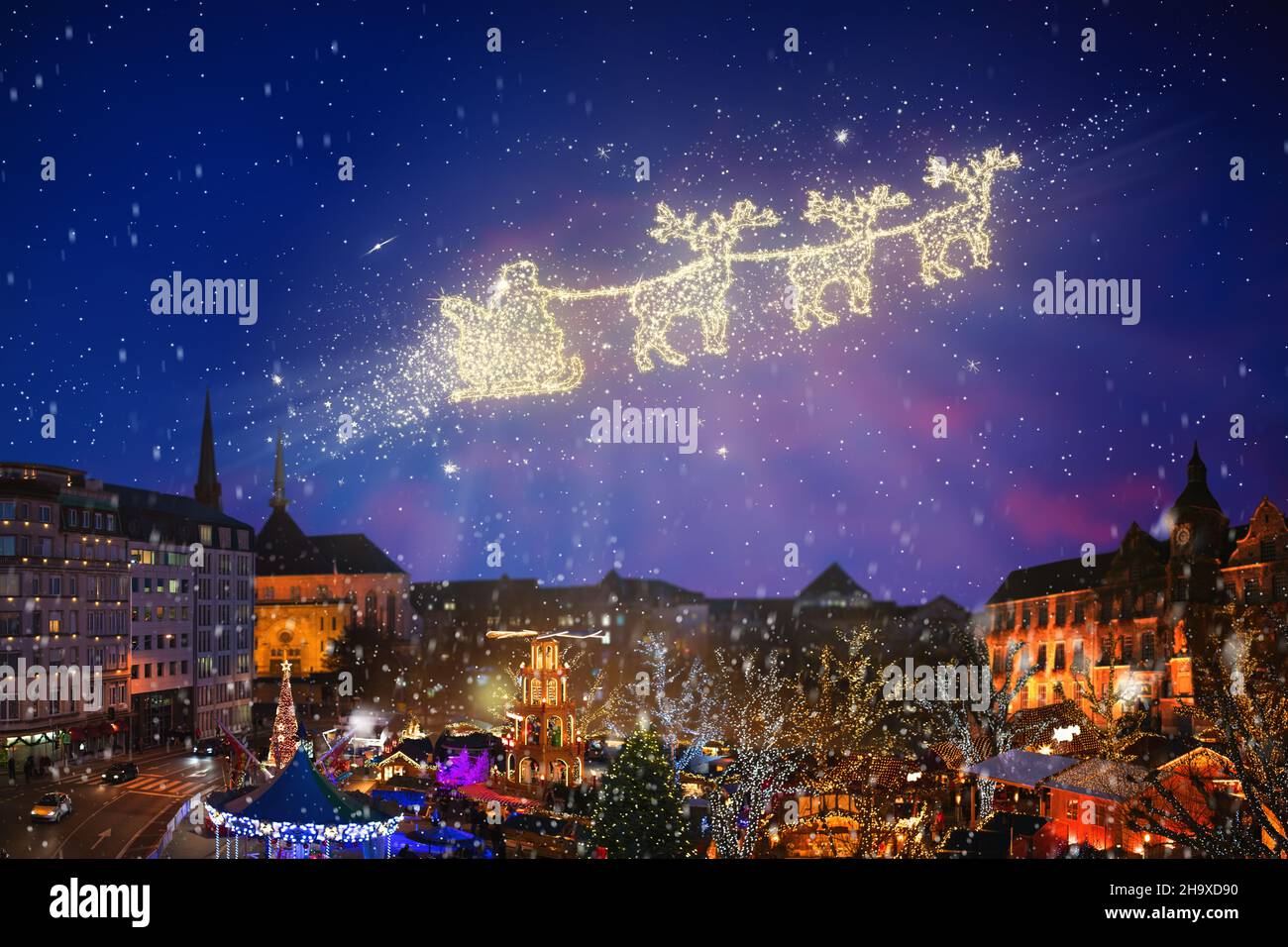 Santa and sleigh flying over house hi-res stock photography and images ...