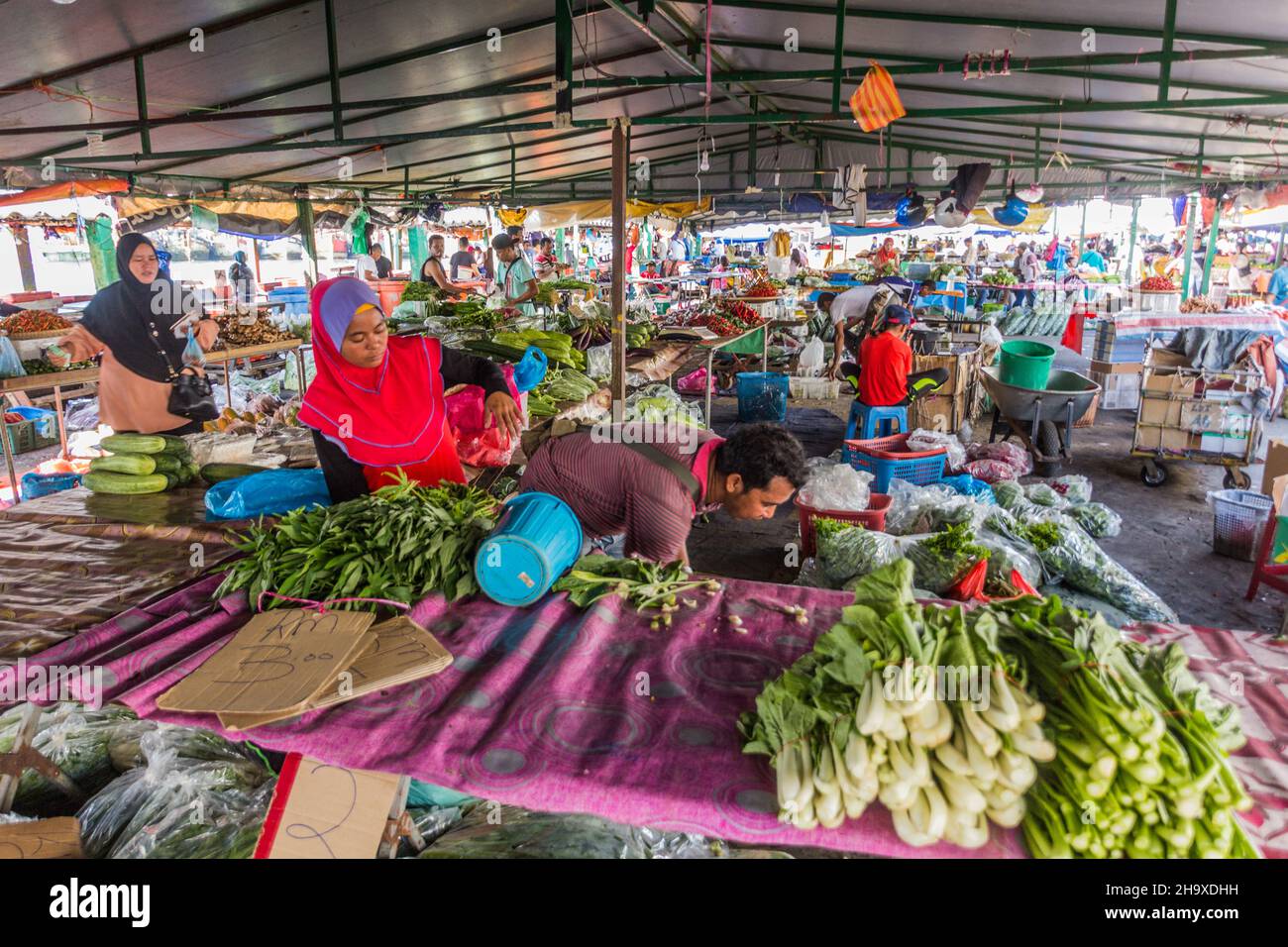 KOTA KINABALU, MALAYSIA - FEBRUARY 23, 2018: Vegetable stalls at the ...
