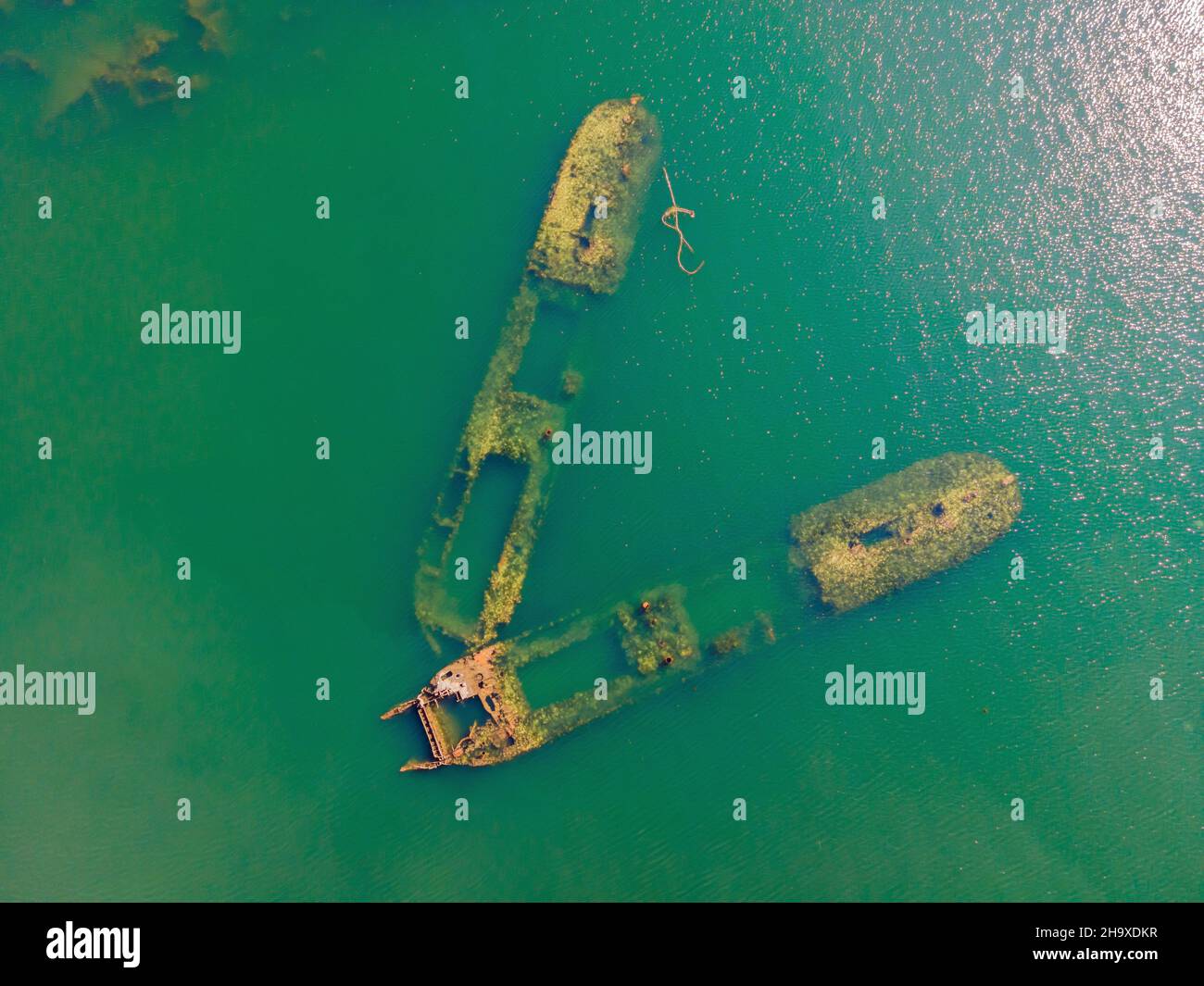Abandoned broken shipwreck sticking out of the sea Stock Photo - Alamy