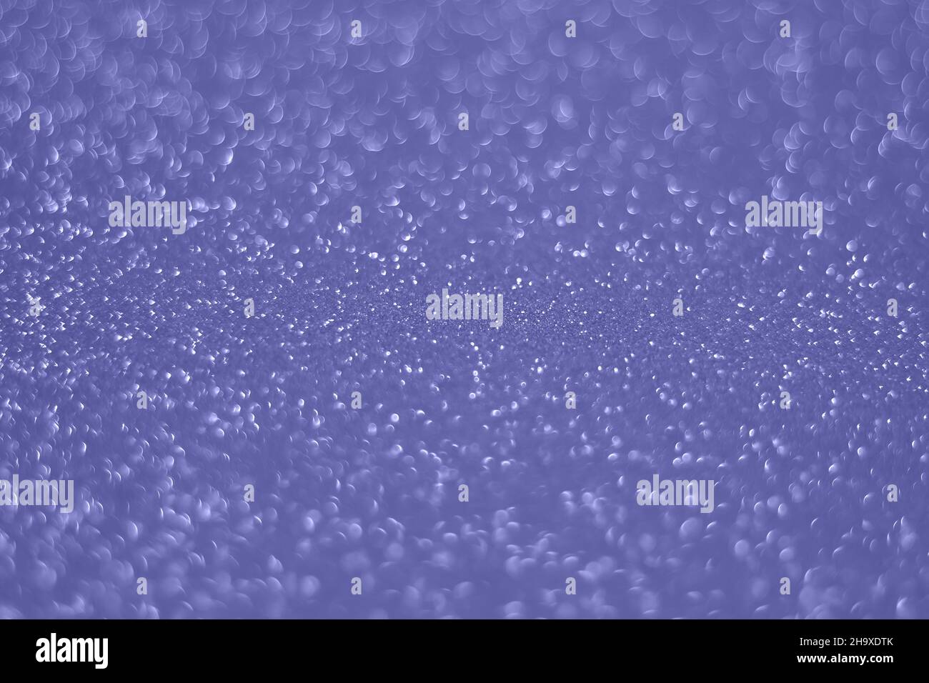 Blurred glitter background of very peri color Stock Photo - Alamy